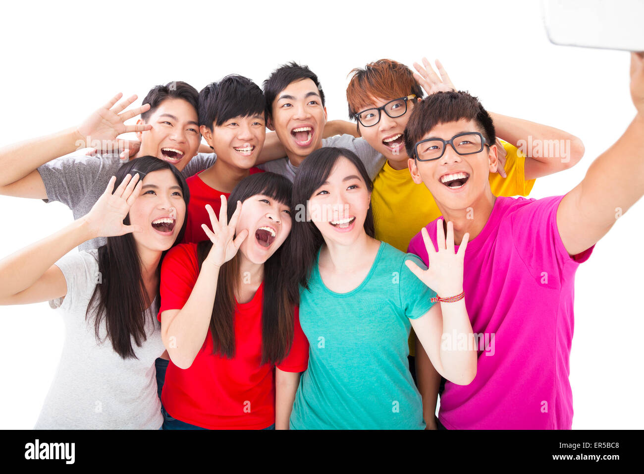 group of smiling friends with camera taking self photo Stock Photo - Alamy
