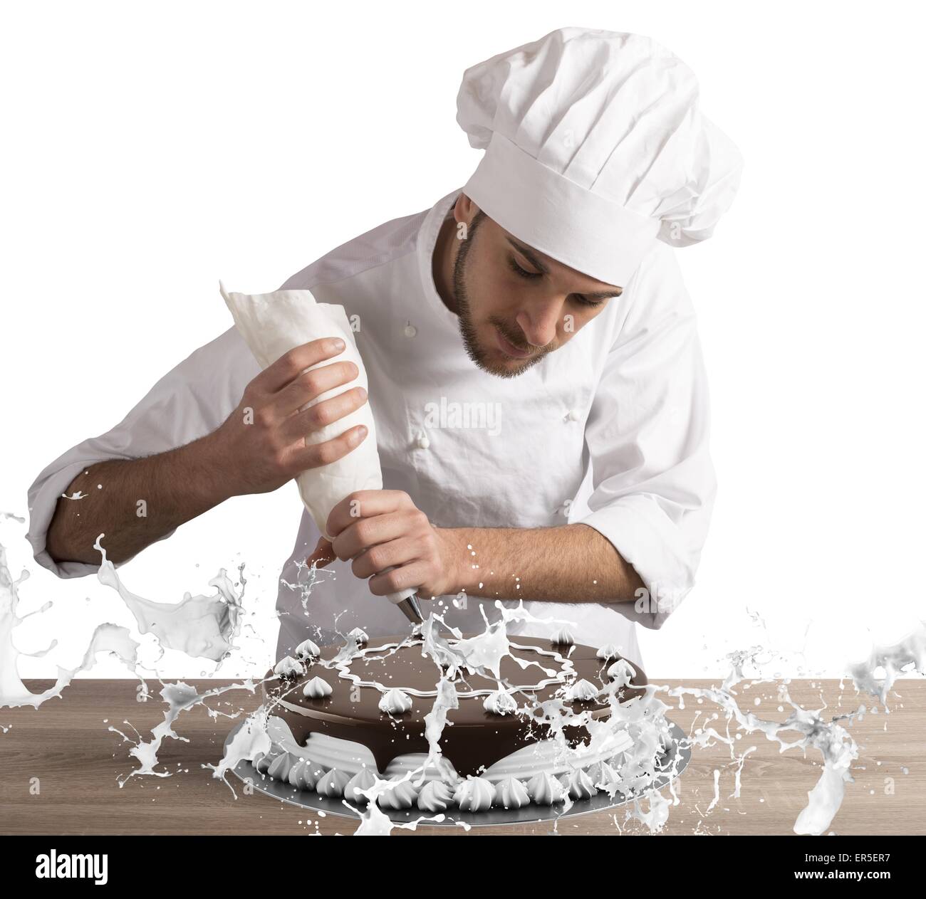Pastry chef decorating Stock Photo - Alamy