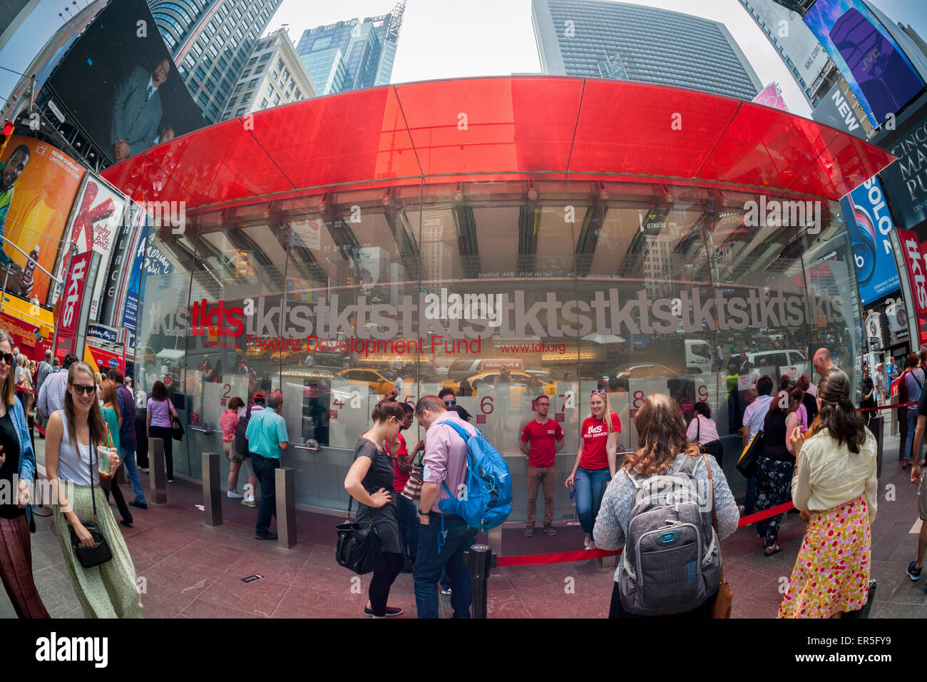 Theatergoers at the TKTS half-price tickets booth in Times Square in ...