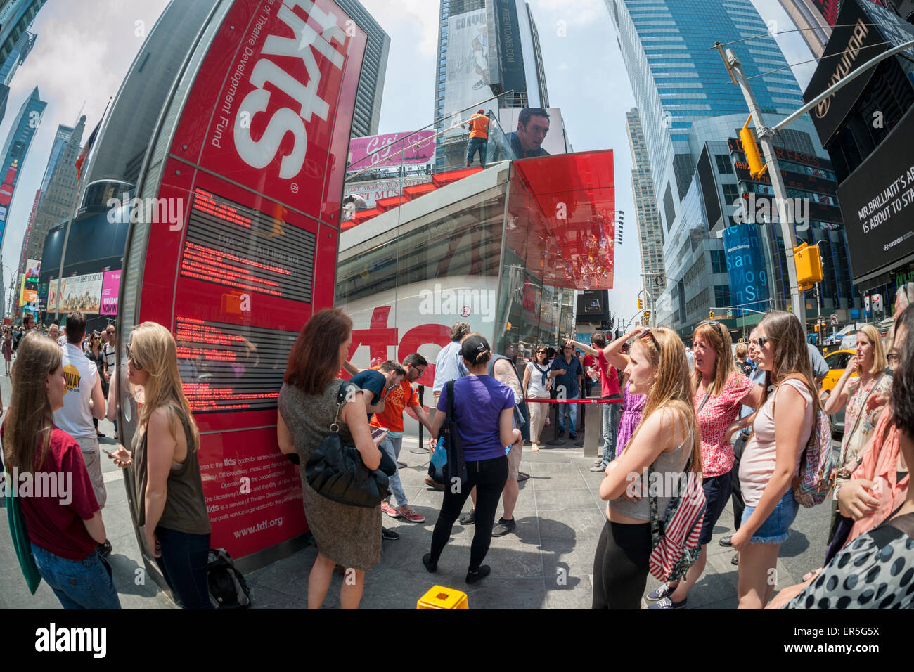 Theatergoers at the TKTS half-price tickets booth in Times Square in ...