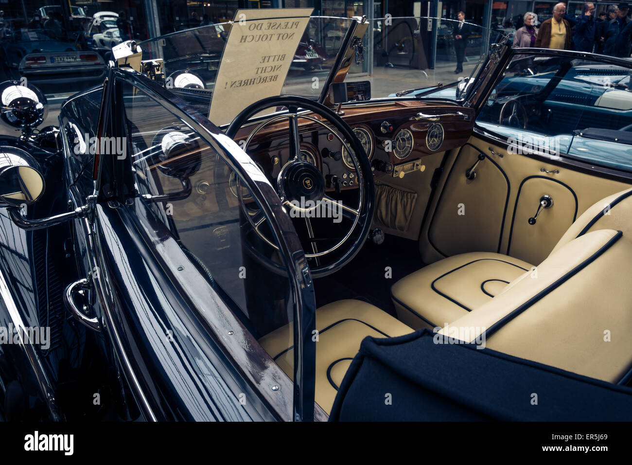 The driver and passenger of the vintage car Horch 853A Sport Cabriolet ...