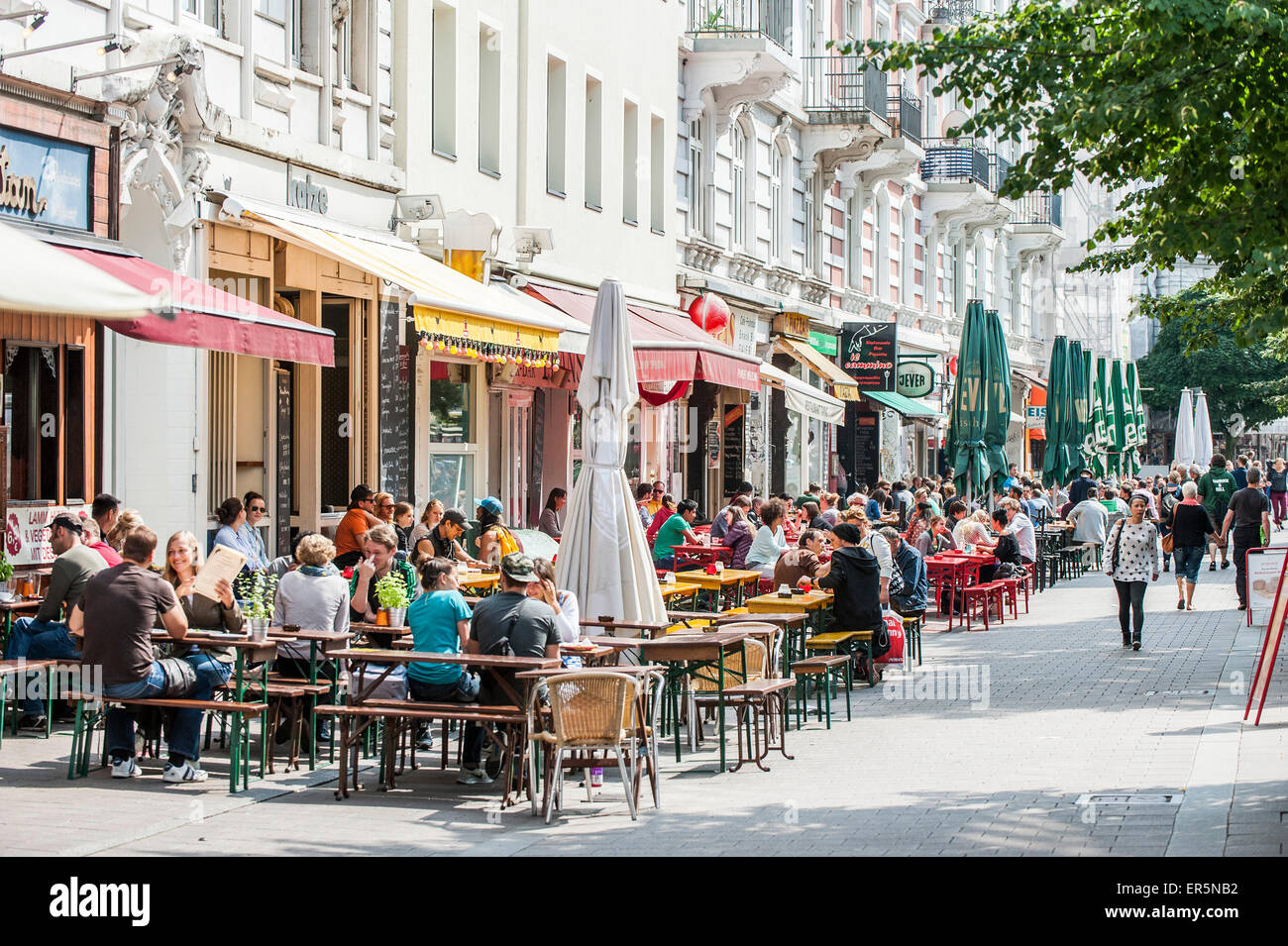 People sitting in street cafes in Hamburg Schanzenviertel, Hamburg ...