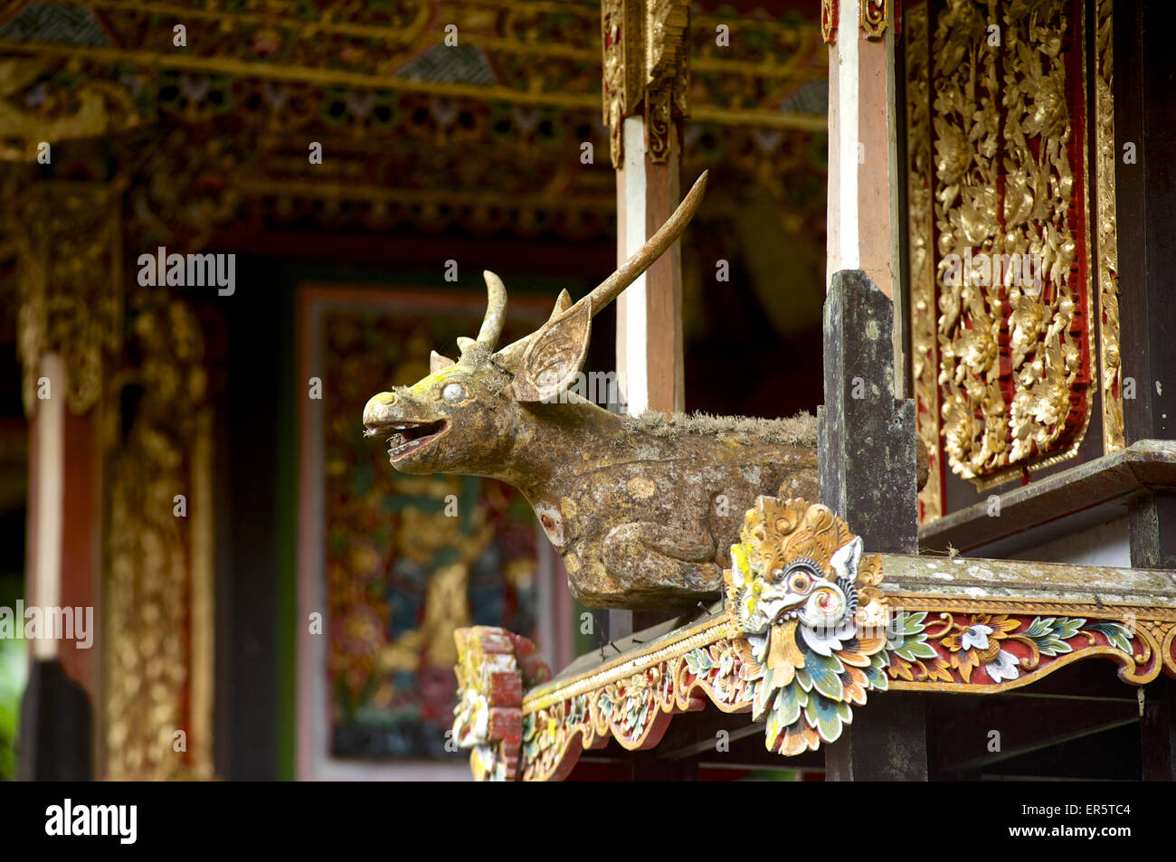 Tirtha Empul temple at a sacred spring, carved sculpture of a deer on ...