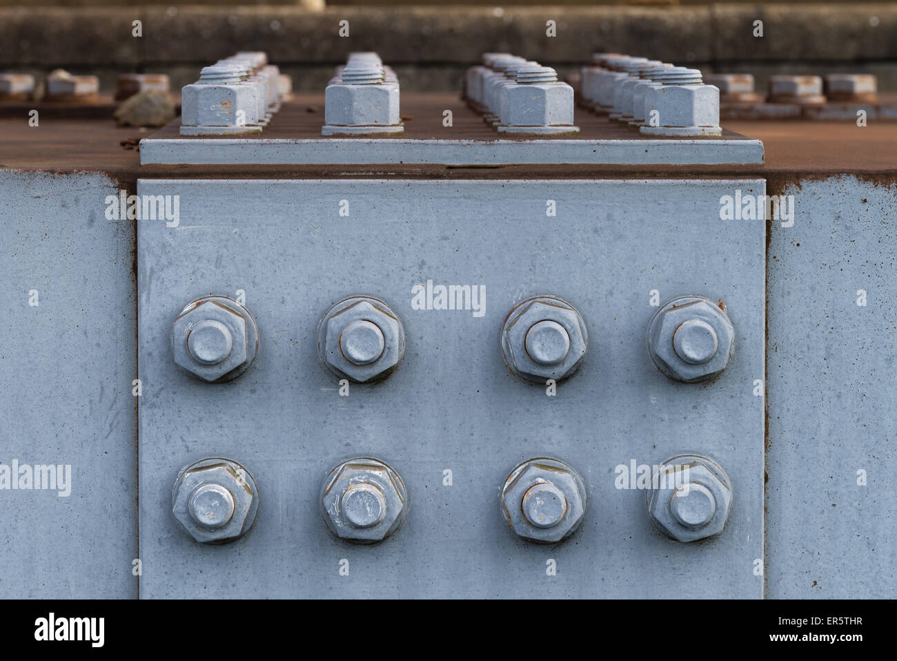 A close up of rusted nuts and bolts on a metal bridge Stock Photo - Alamy