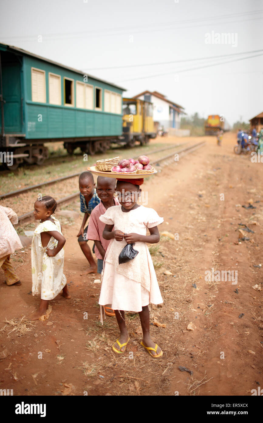 Children beside railroad tracks, between Ouidah and Cotonou, Benin ...