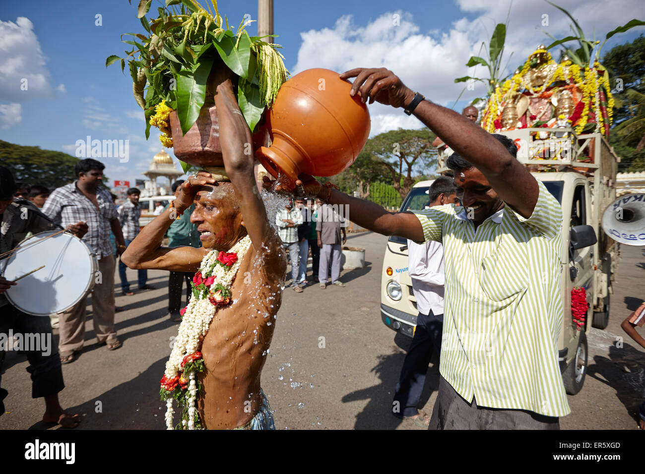 Pilgrim carrying holy water on his head, Mysore, Karnataka, India Stock ...