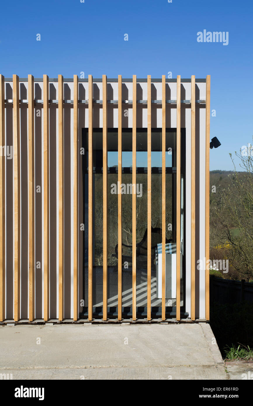 Detail timber cladding and view through house Upside down house ...