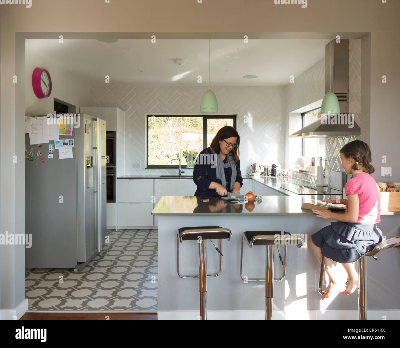 Interior view kitchen with people at breakfast bar Upside down house ...