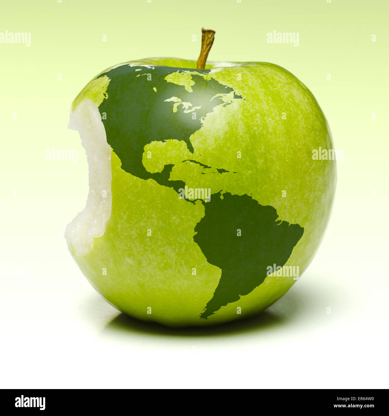 Whole green apple with planet earth map applied (Americas Stock Photo ...