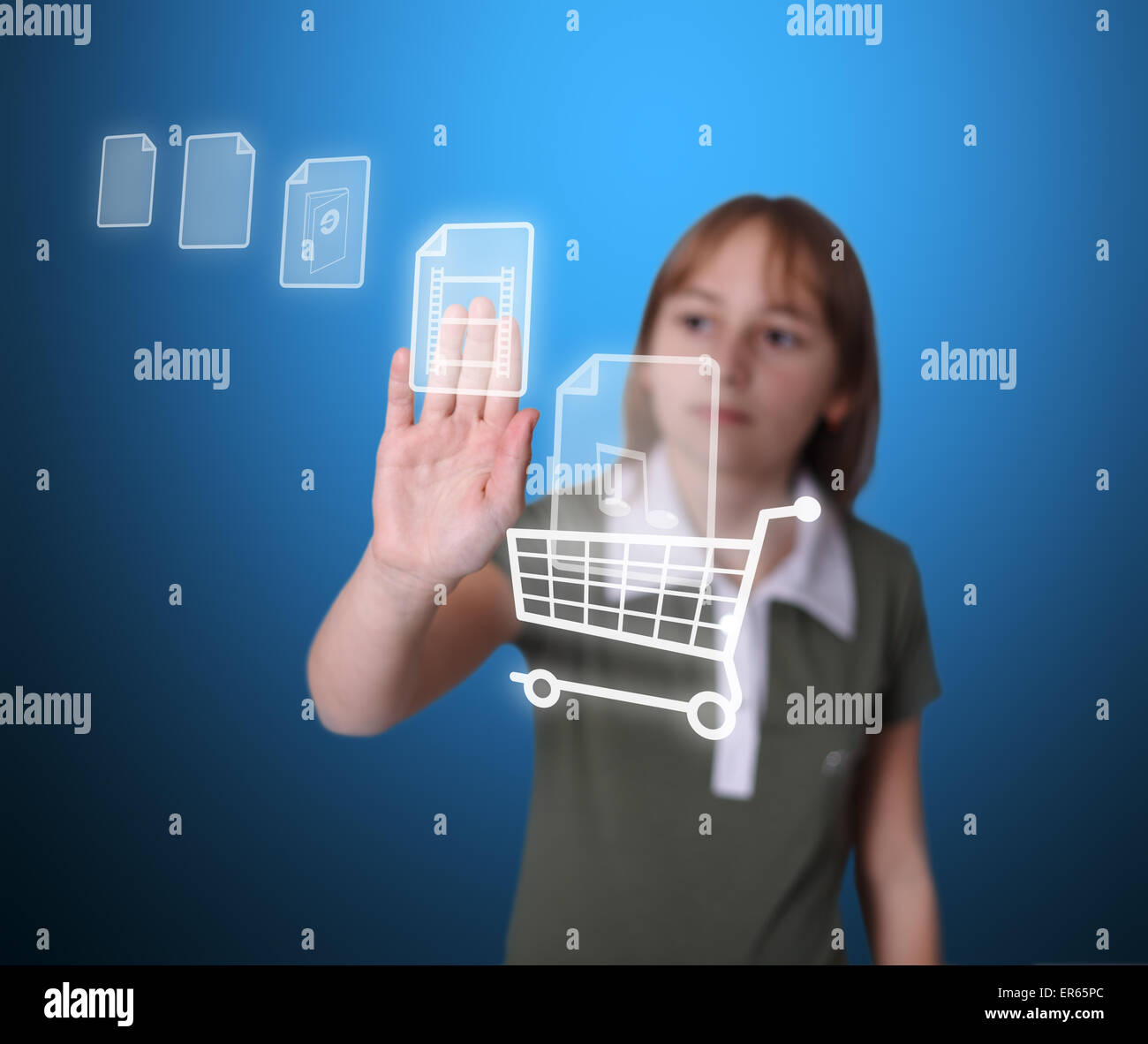 Teenager girl puts multimedia files into virtual cart on glowing touch ...