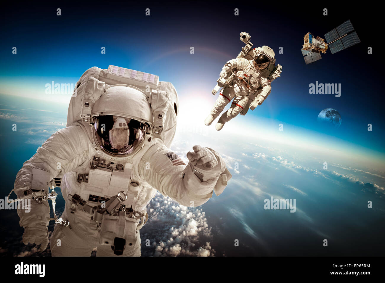 Astronaut in outer space against the backdrop of the planet earth ...