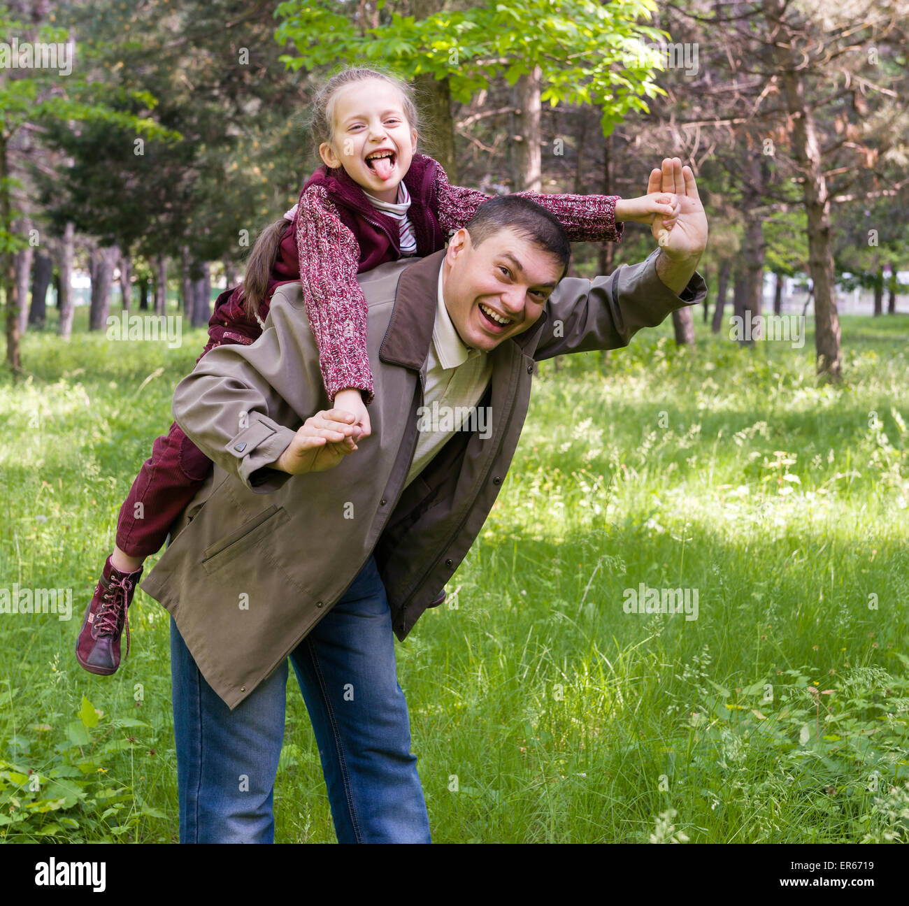 Father and daughter in the park at spring Stock Photo - Alamy