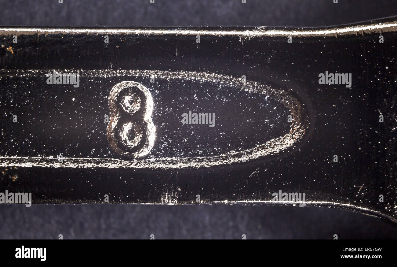 Molten number on metal surface, dusty and dirty surface details Stock ...