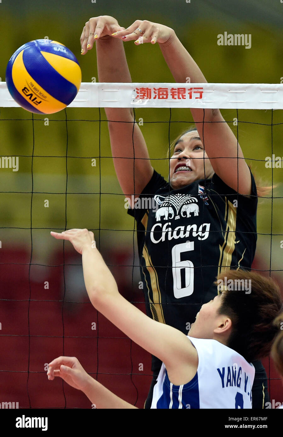 Tianjin, China. 28th May, 2015. Onuma of Thailand blocks the ball ...
