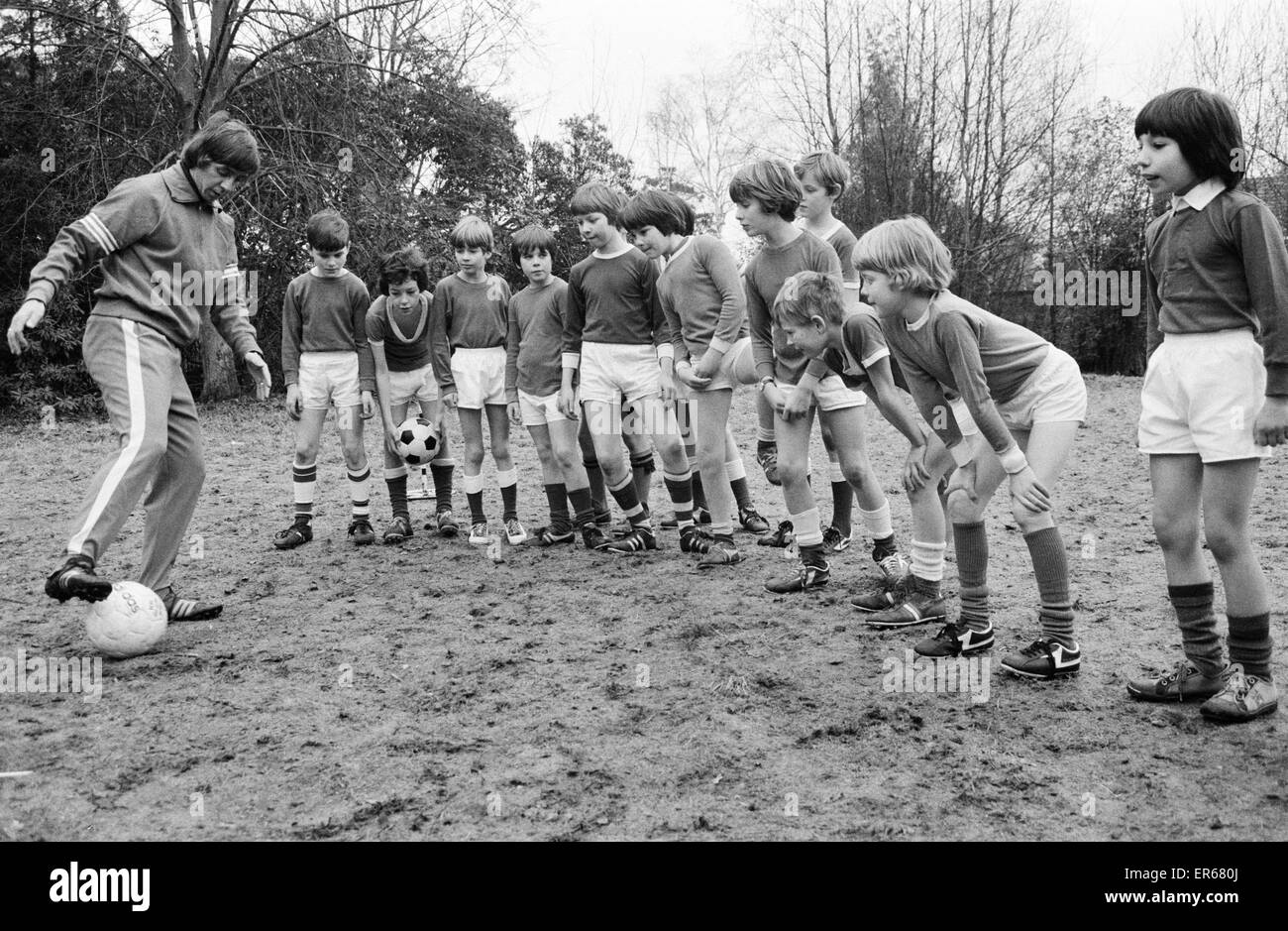 Queens Park Rangers footballer Don Masson coaching children to play ...