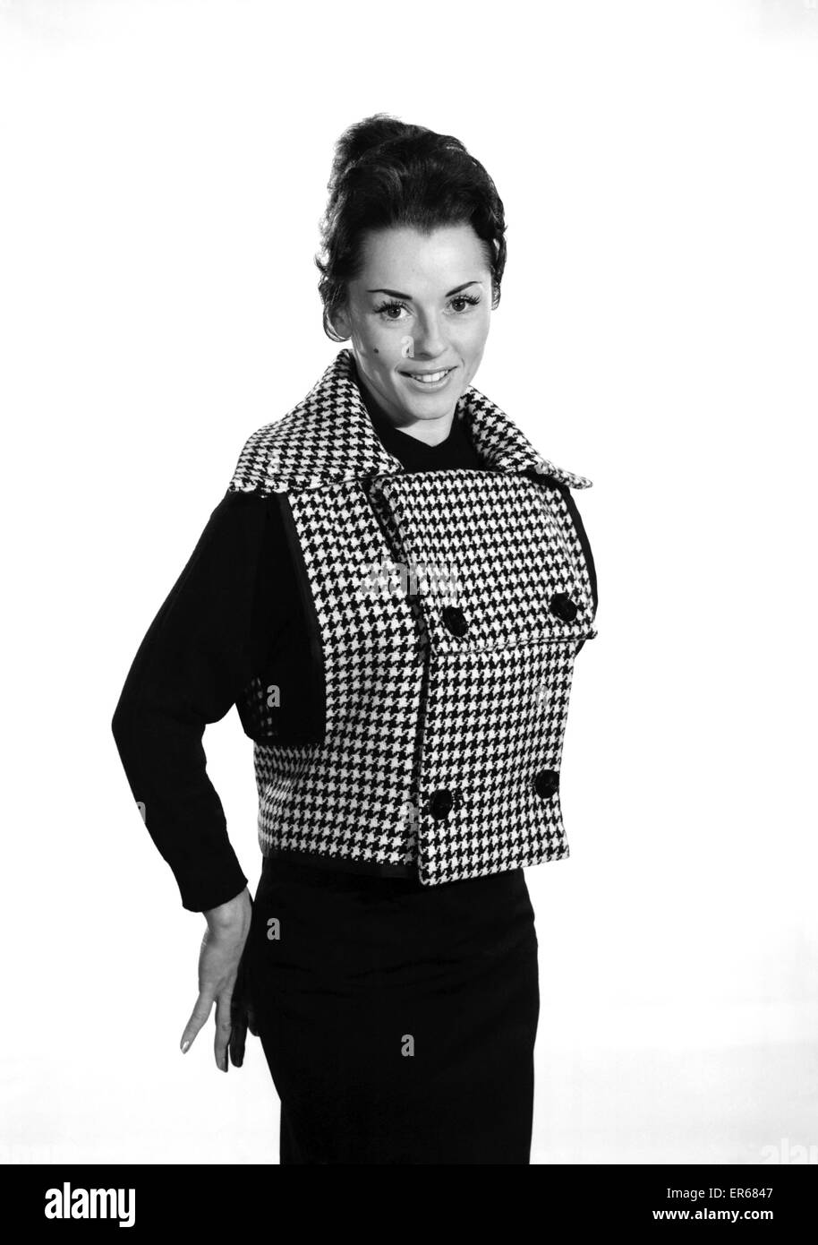 Clothing: Fashion: Jacket: Woman wearing check jacket. Model: Barbara ...