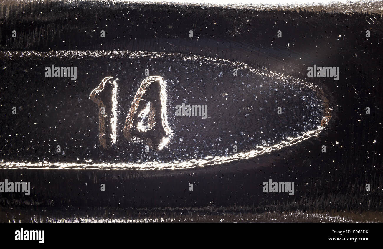 Molten number on metal surface, dusty and dirty surface details Stock ...