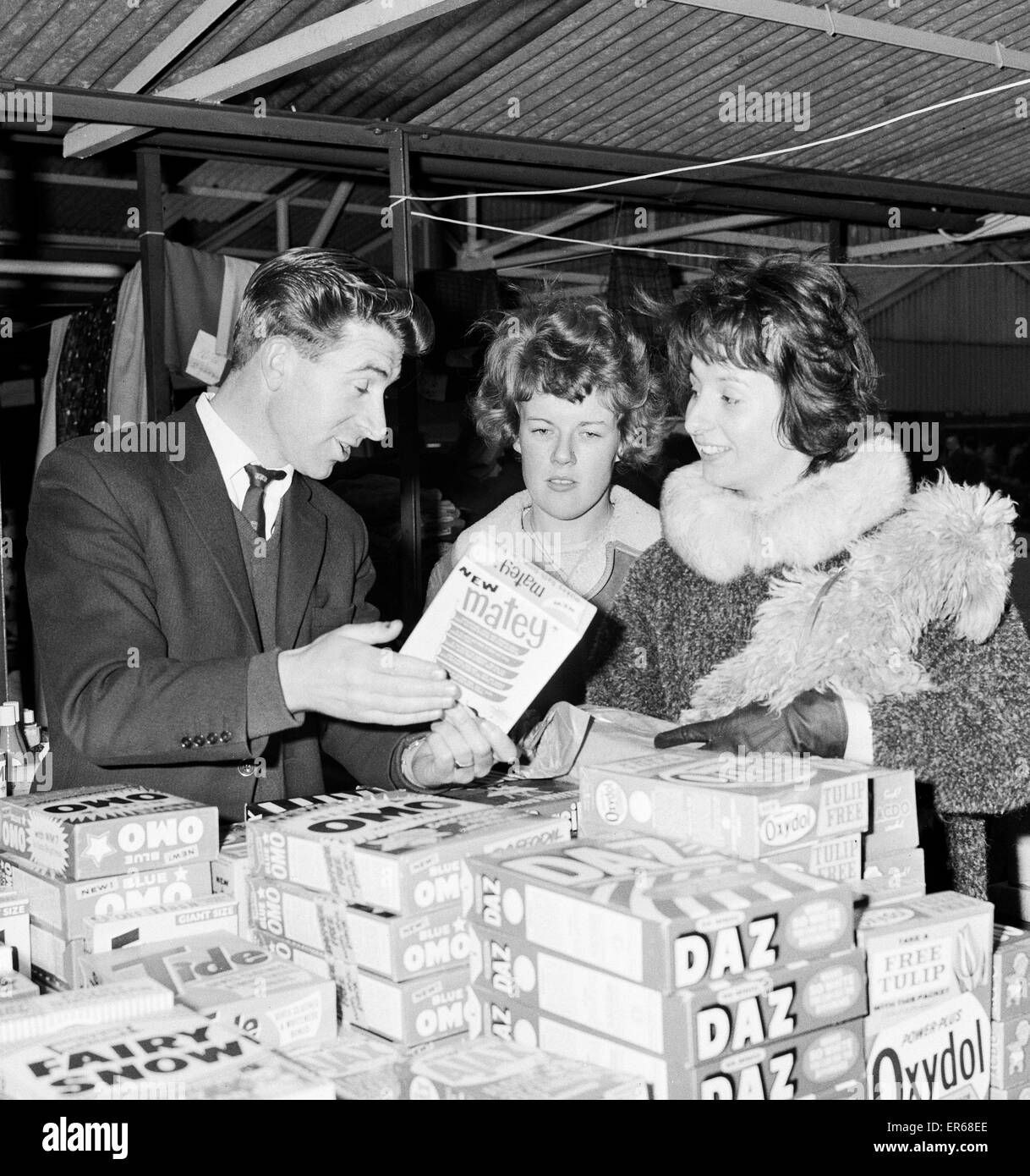Blackburn Rovers footballer Bryan Douglas serving on his stall at the ...