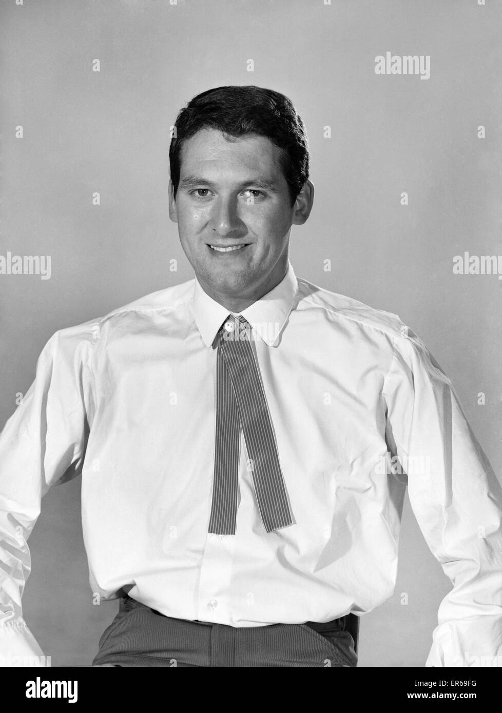 Clothing: Fashion: Menswear: Man wearing shirt and tie. Model: Mike ...