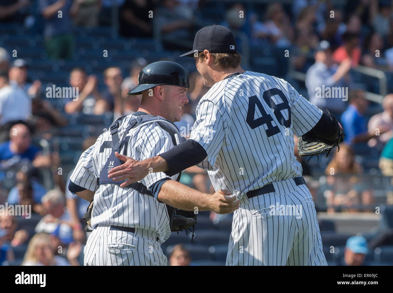 Bronx, New York, USA. 27th May, 2015. Yankees' relief pitcher ANDREW MILLER and catcher BRIAN ...