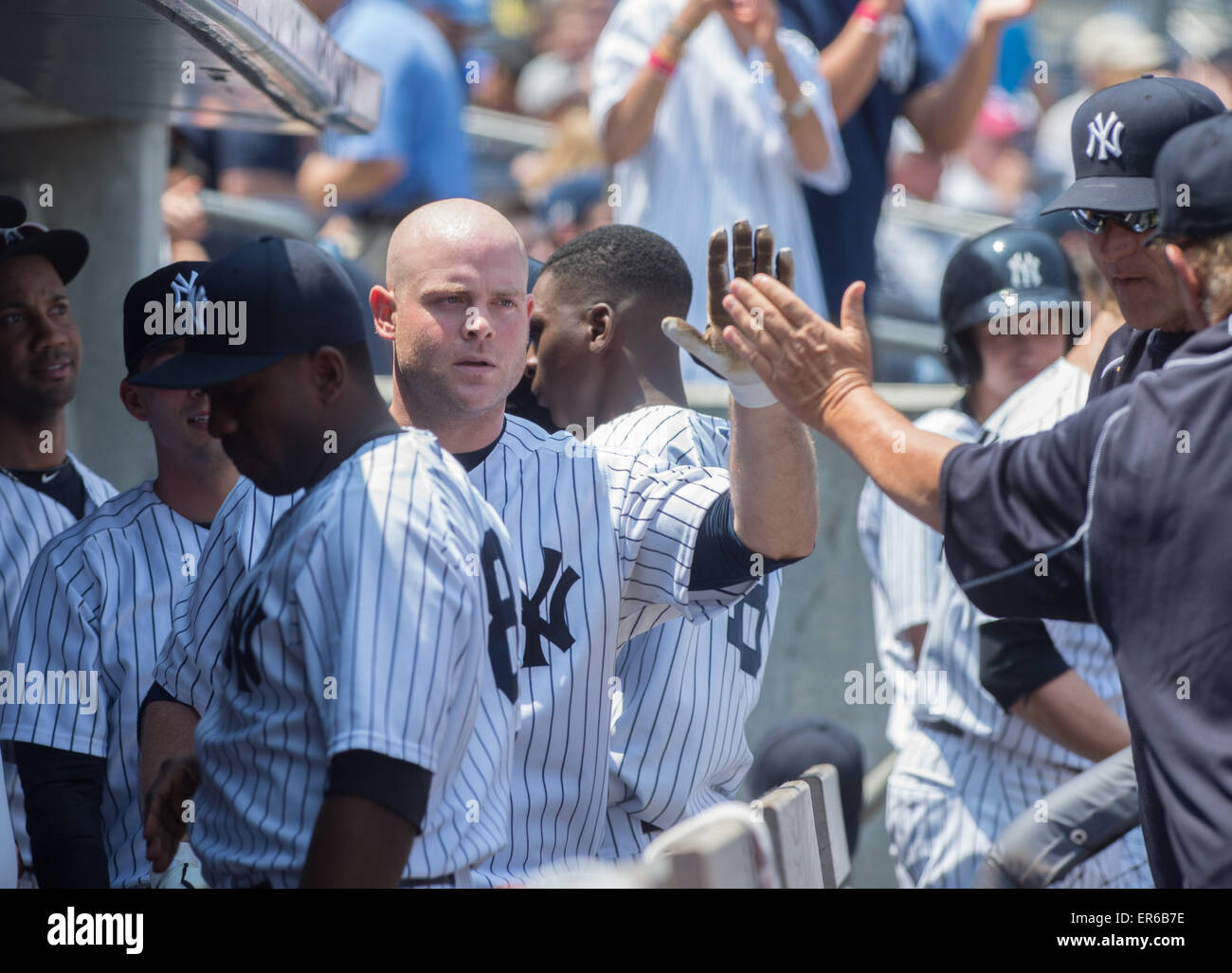 Bronx, New York, USA. 27th May, 2015. Yankees' BRIAN MCCANN is greeted ...