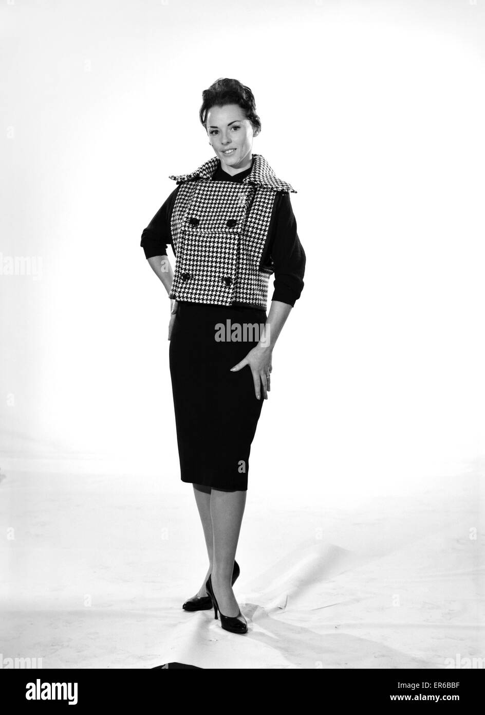 Clothing: Fashion: Jacket: Woman wearing check jacket. Model: Barbara ...