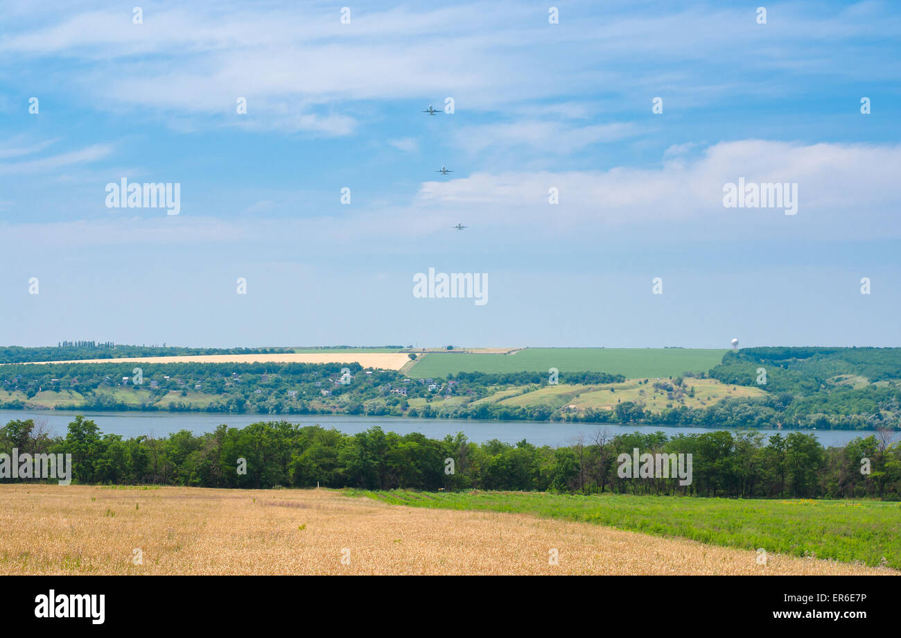 Summer landscape with phases of an airplane take-off Stock Photo - Alamy