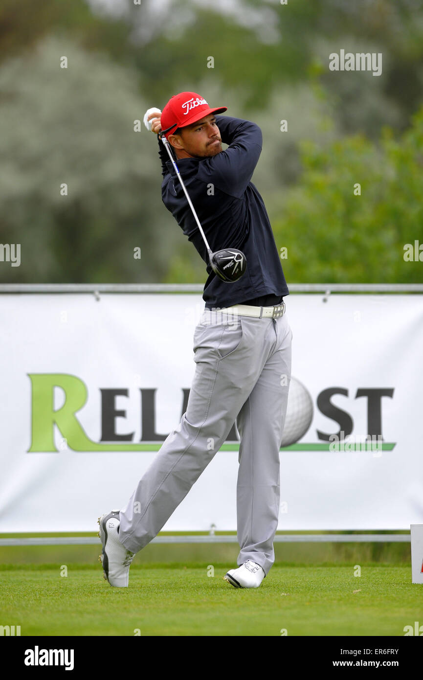 Golf player Adam Rajmont from Czech Republic drives a ball during D D ...