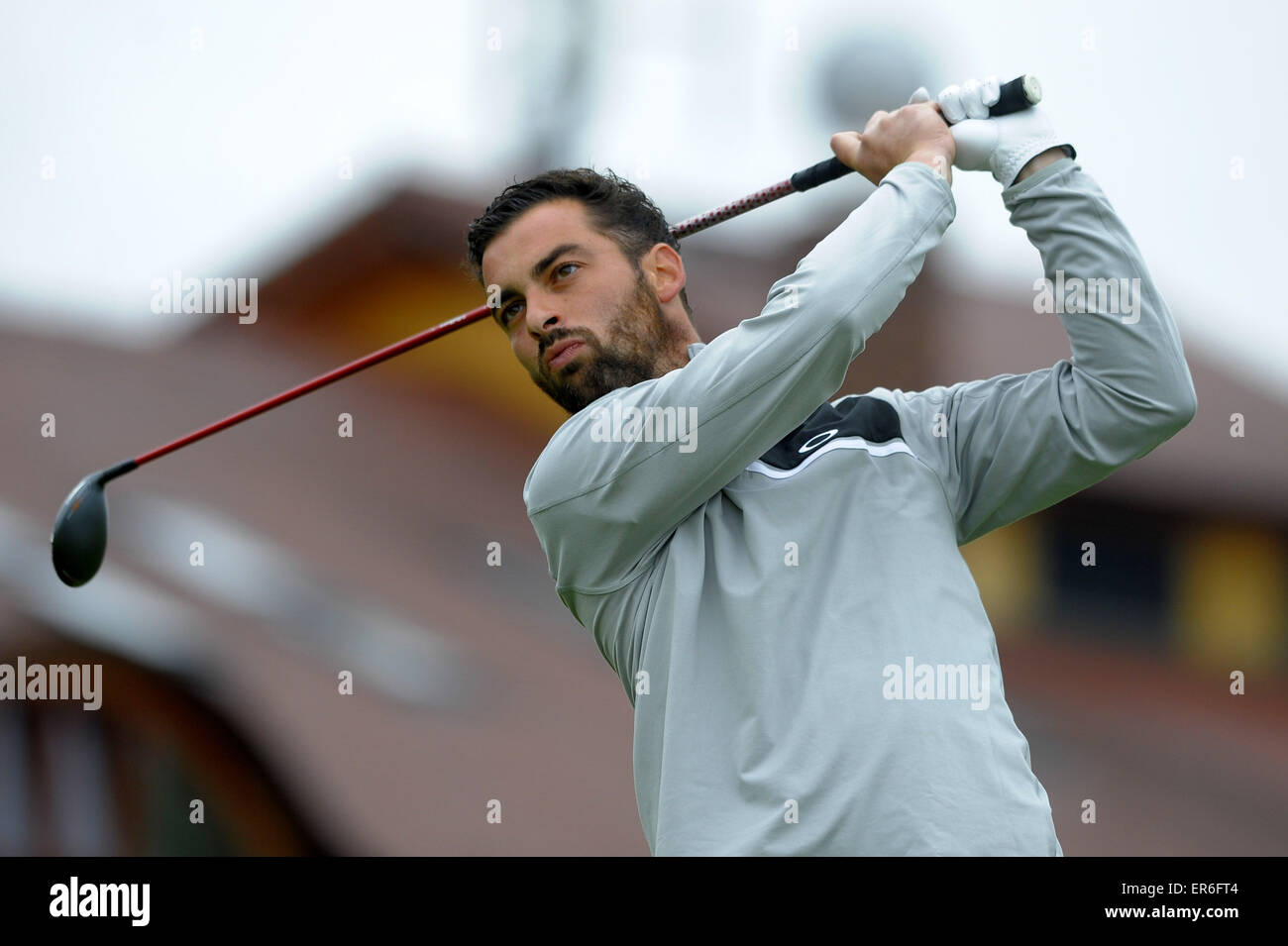 Golf player Thomas Linard from France drives a ball during D D Real ...