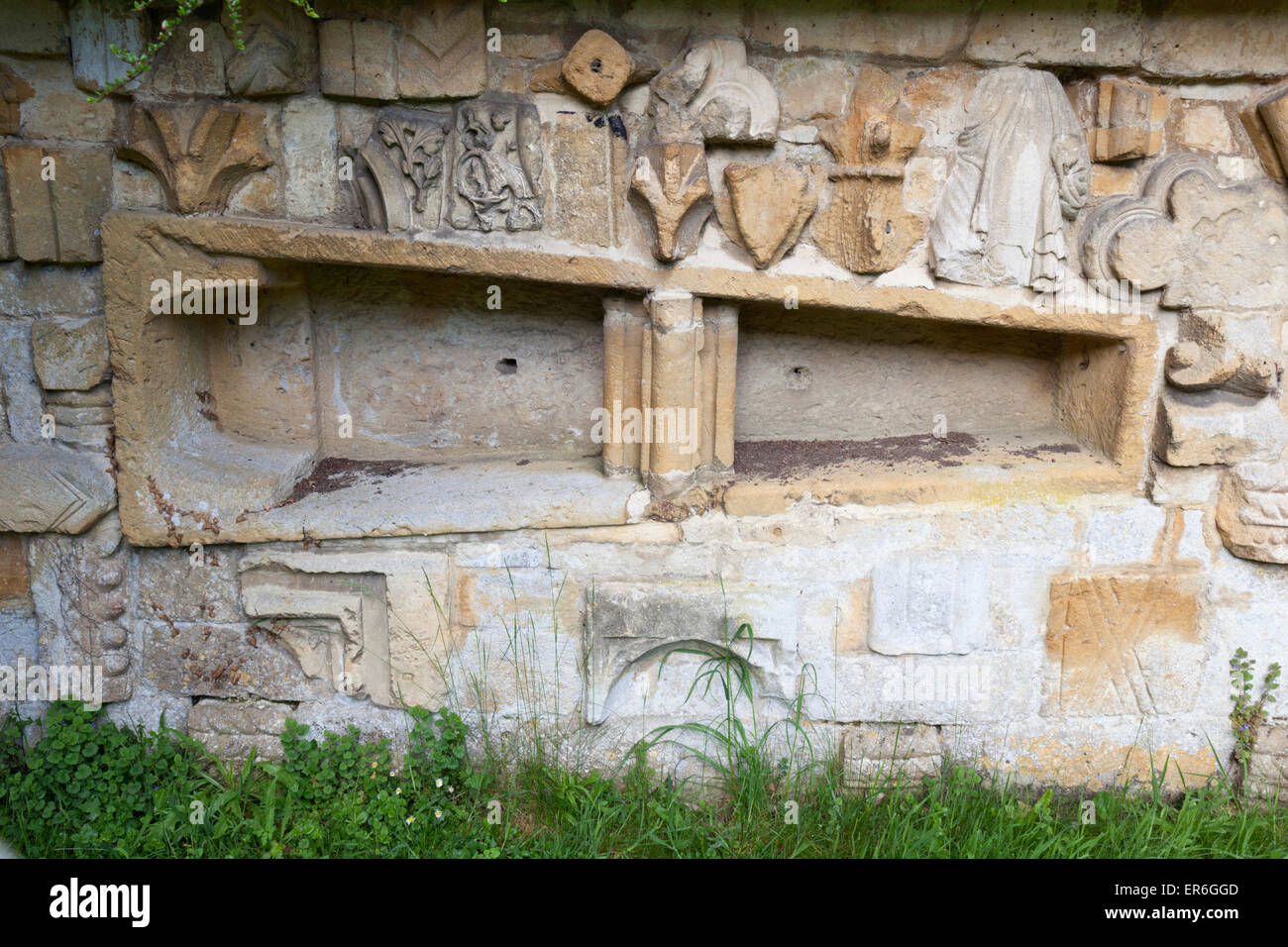 Stone carvings and sarcophagus buried in walls of Stanway church ...