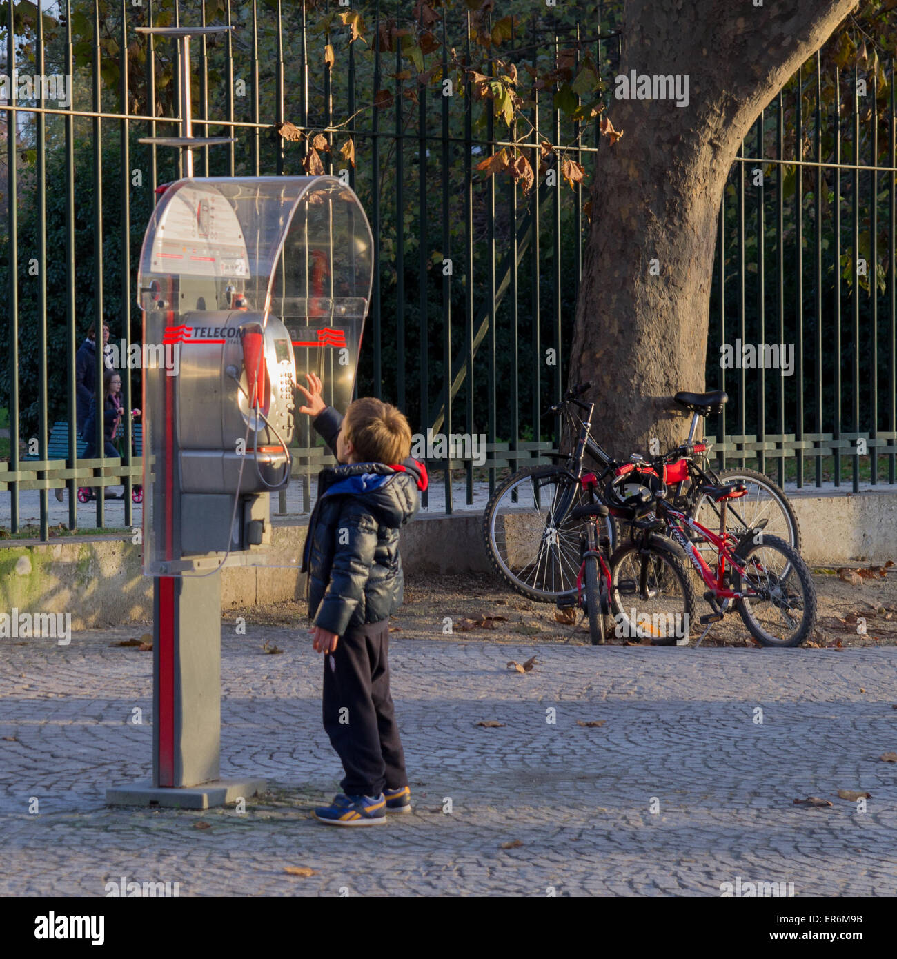 Kid picking up the phone Stock Photo - Alamy