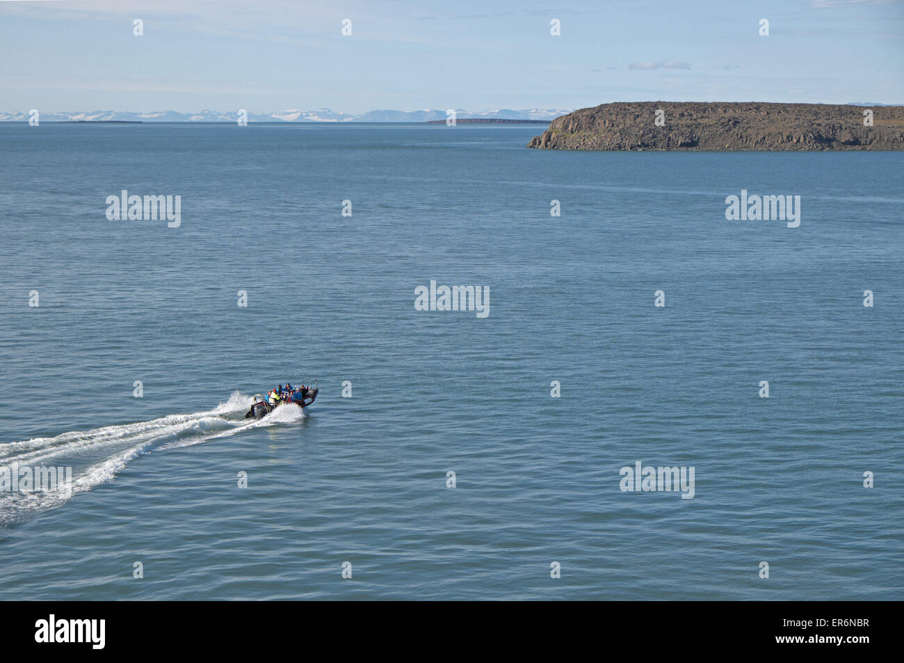 Tourists going ashore in one of MV Fram's Zodiac boats, Sundneset ...