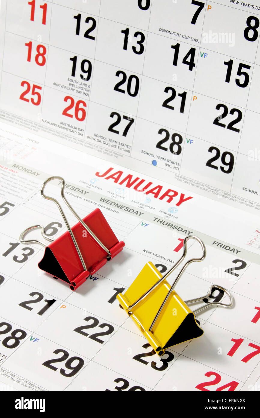 Paper Clips on Calendar Stock Photo - Alamy