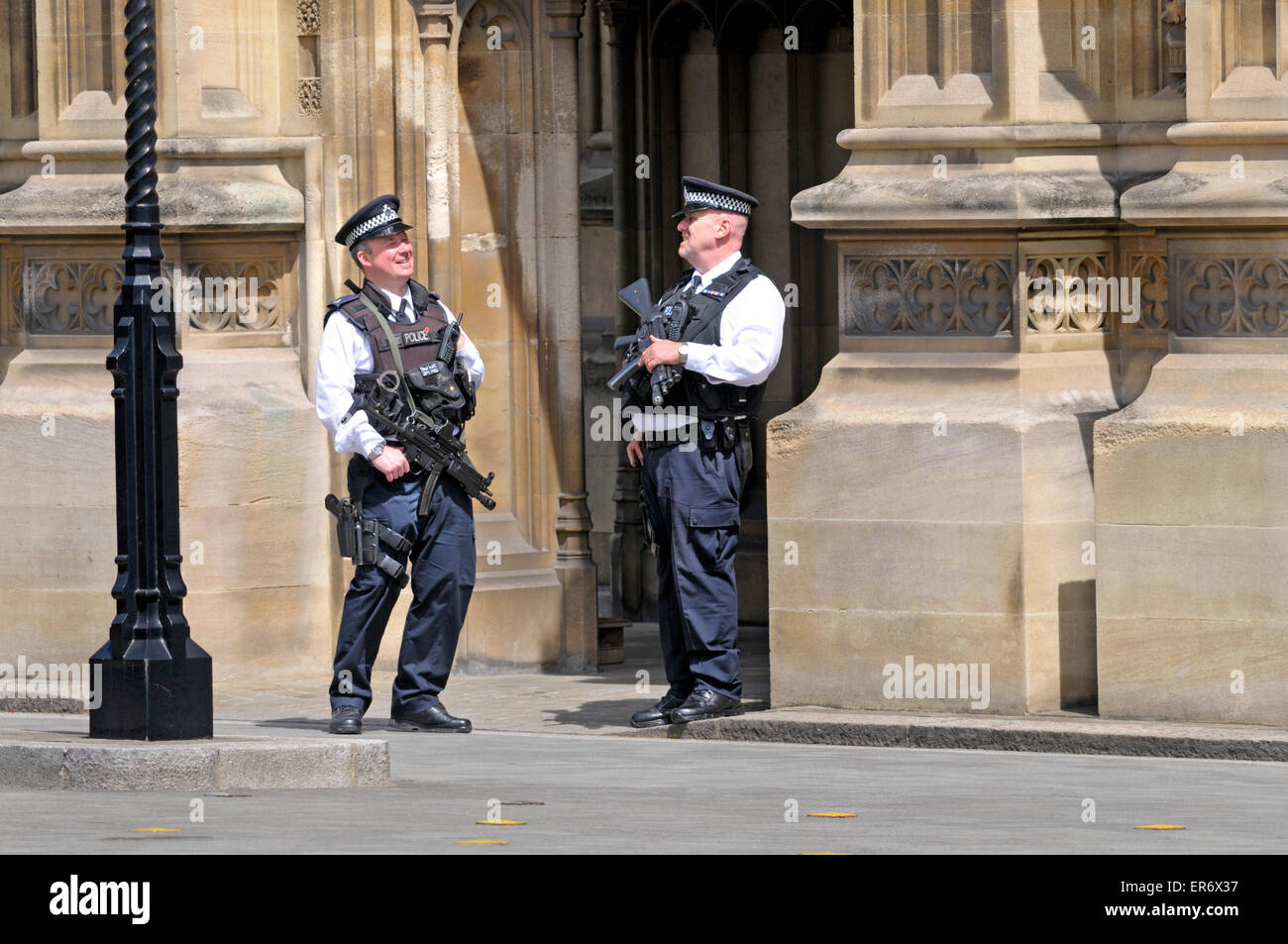 London, England, UK. Armed police on duty at the Houses of Parliament ...
