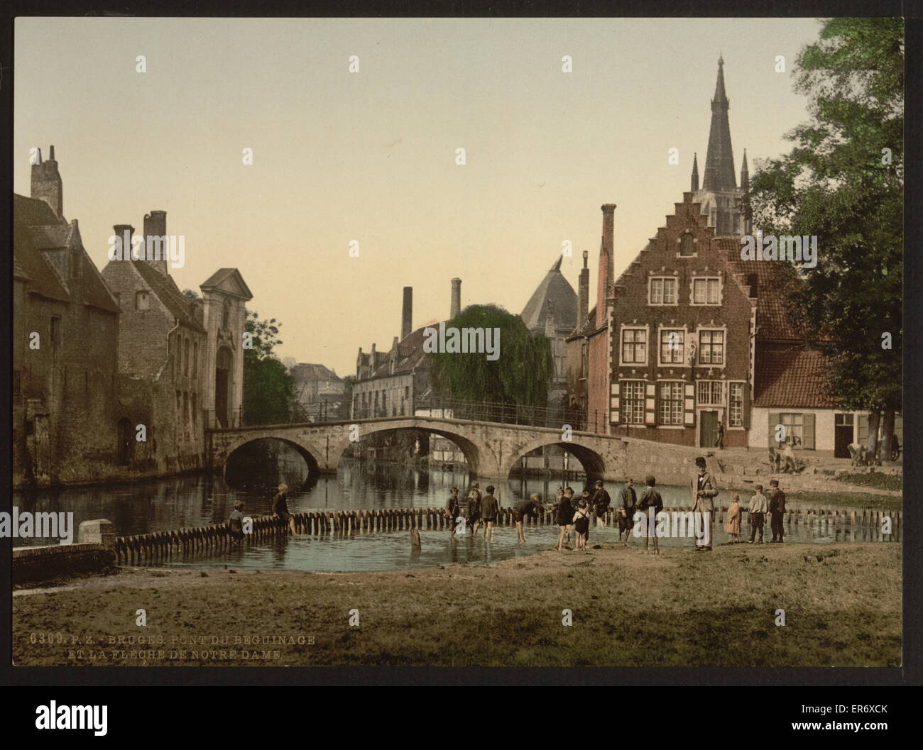 Convent bridge and the spire of Notre Dame, Bruges, Belgium Stock Photo ...