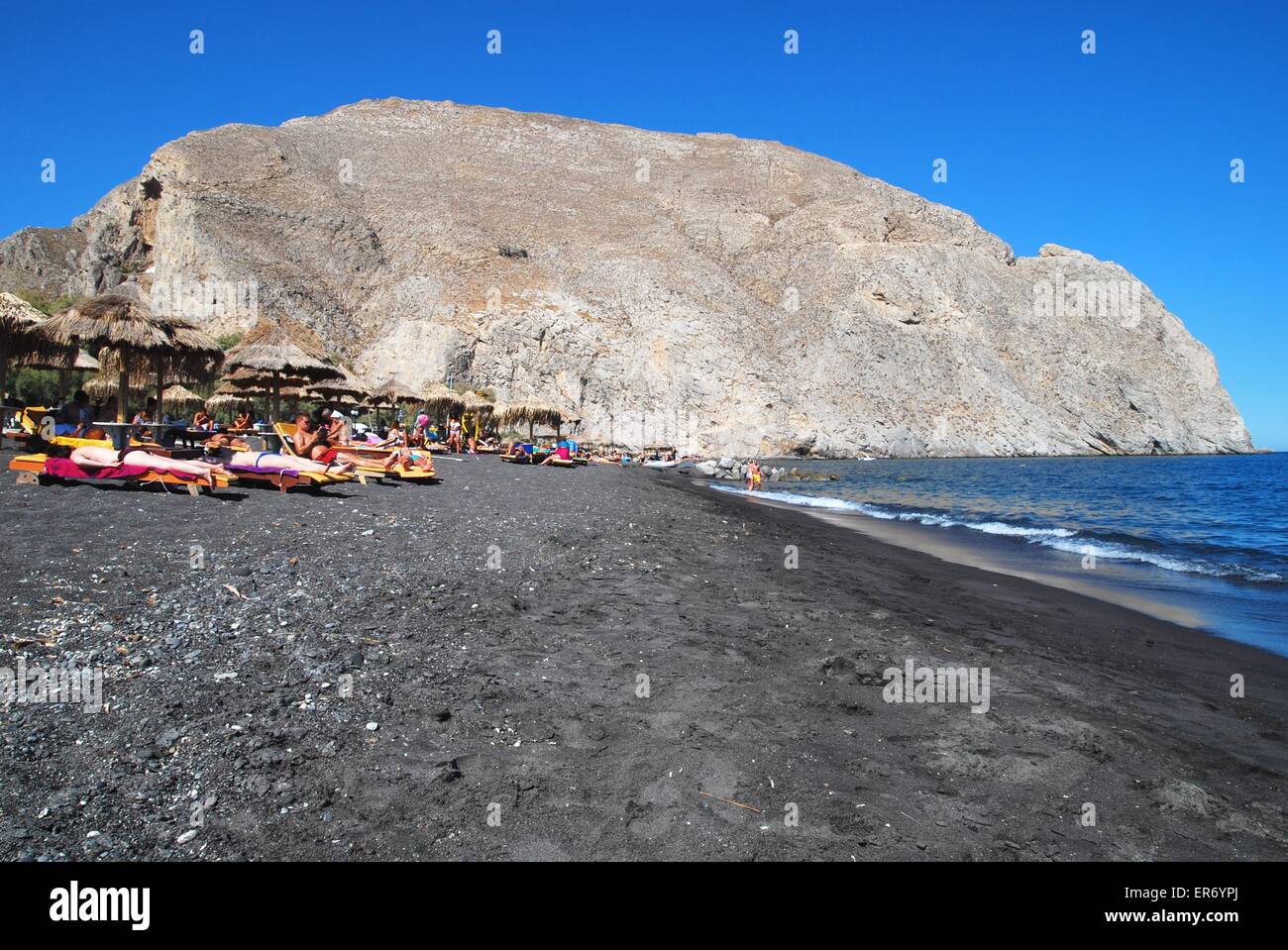 Perissa black sand beach, Santorini, Greece Stock Photo - Alamy