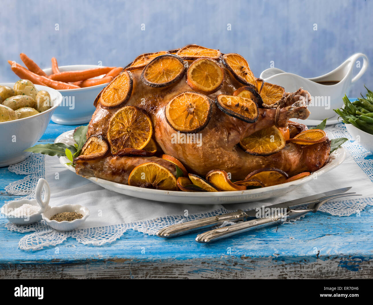 Whole Turkey orange glazed with orange slices Stock Photo - Alamy