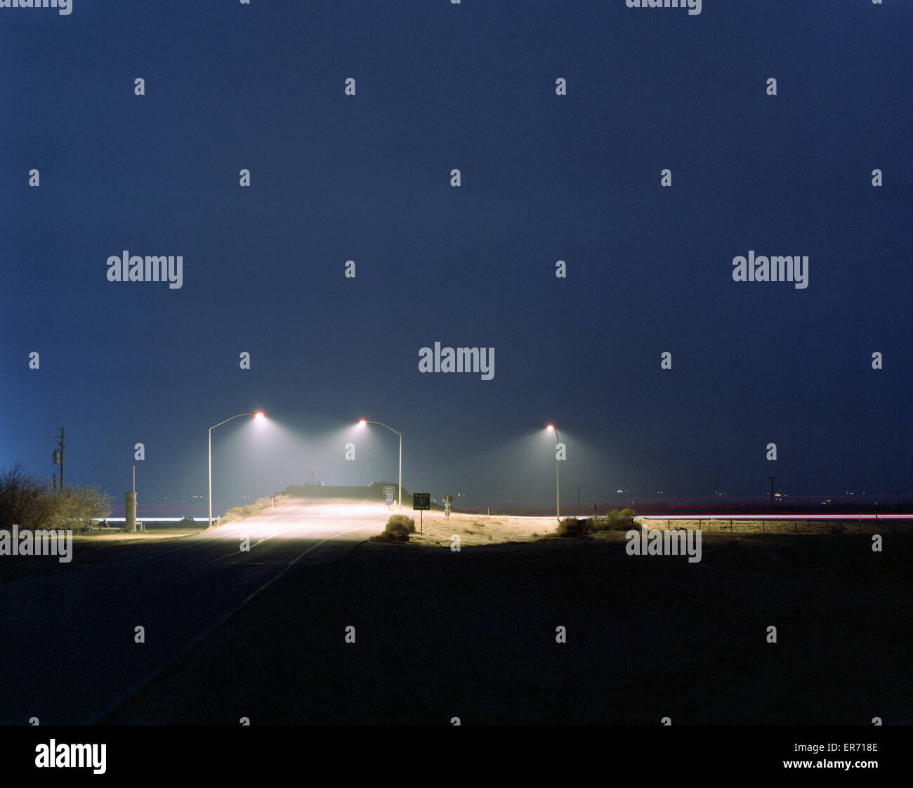 Highway overpass in the fog at night Stock Photo - Alamy