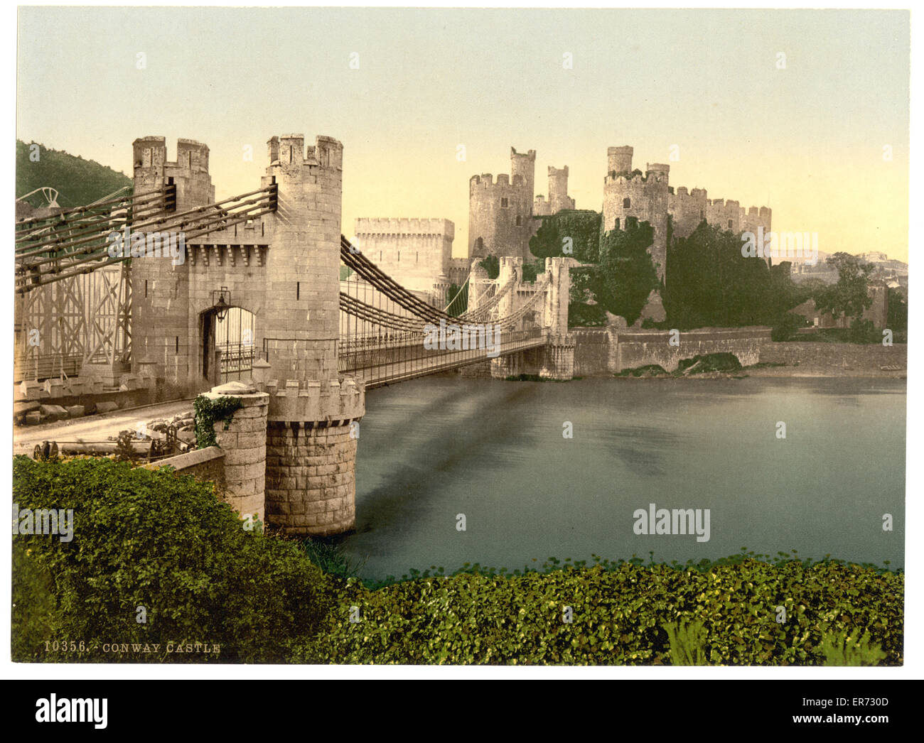 Castle and suspension bridge, Conway (i.e. Conwy), Wales Stock Photo ...