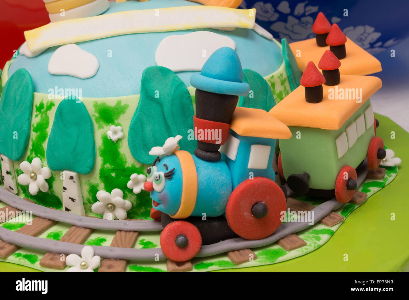 beautiful cake with a fabulous train and other decorations Stock Photo ...