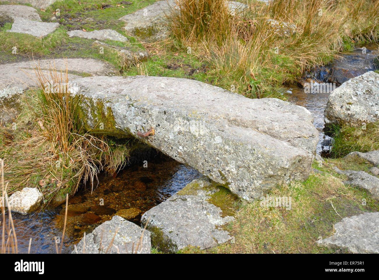 Clapper bridge over Longash Leat, at the rear of Four Winds car park ...
