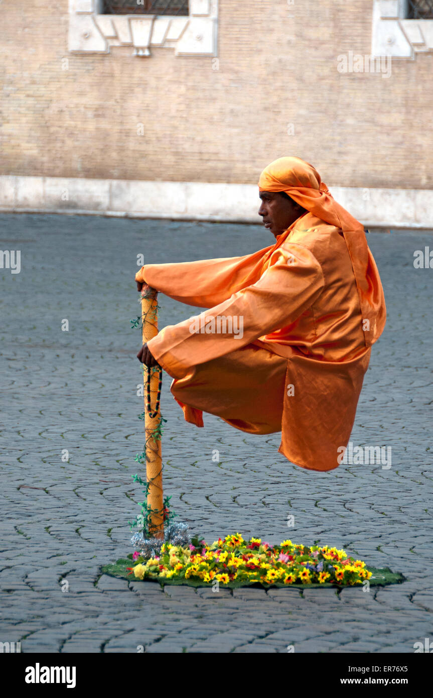 Floating entertainer man busker Stock Photo - Alamy