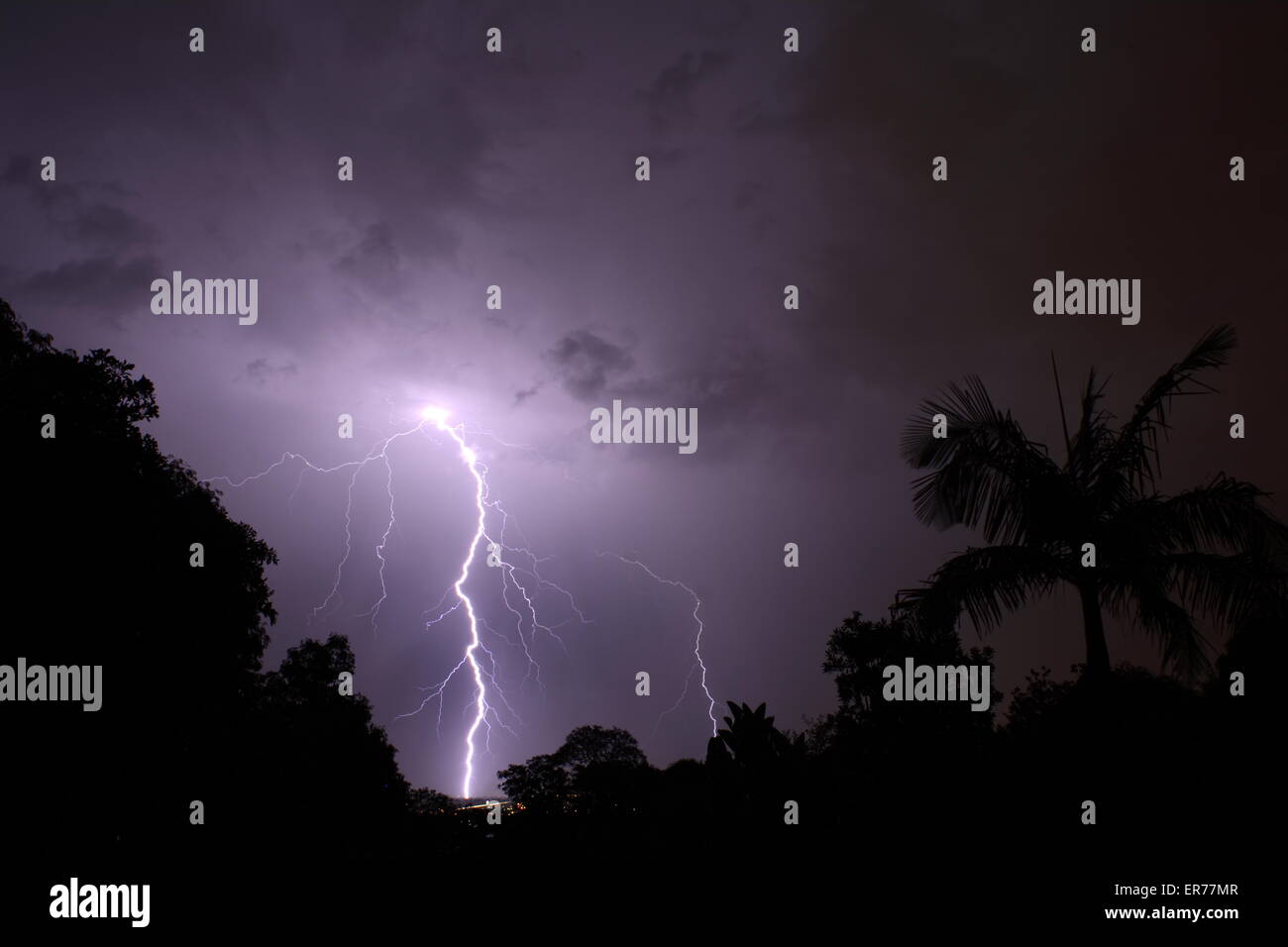 Thunderbolt of lightning at night during a thunderstorm, silhouette of ...