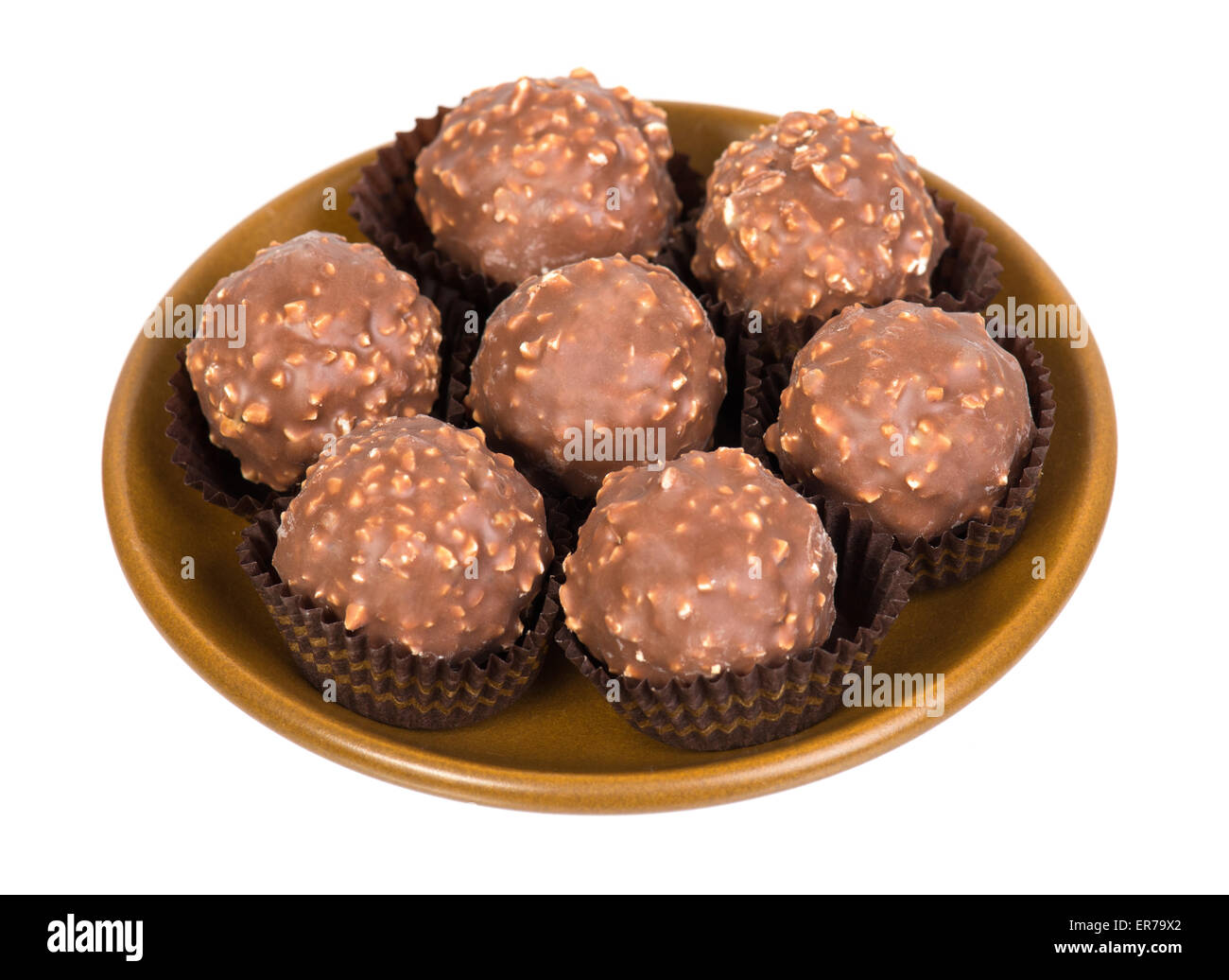chocolate candy on plate isolated Stock Photo - Alamy