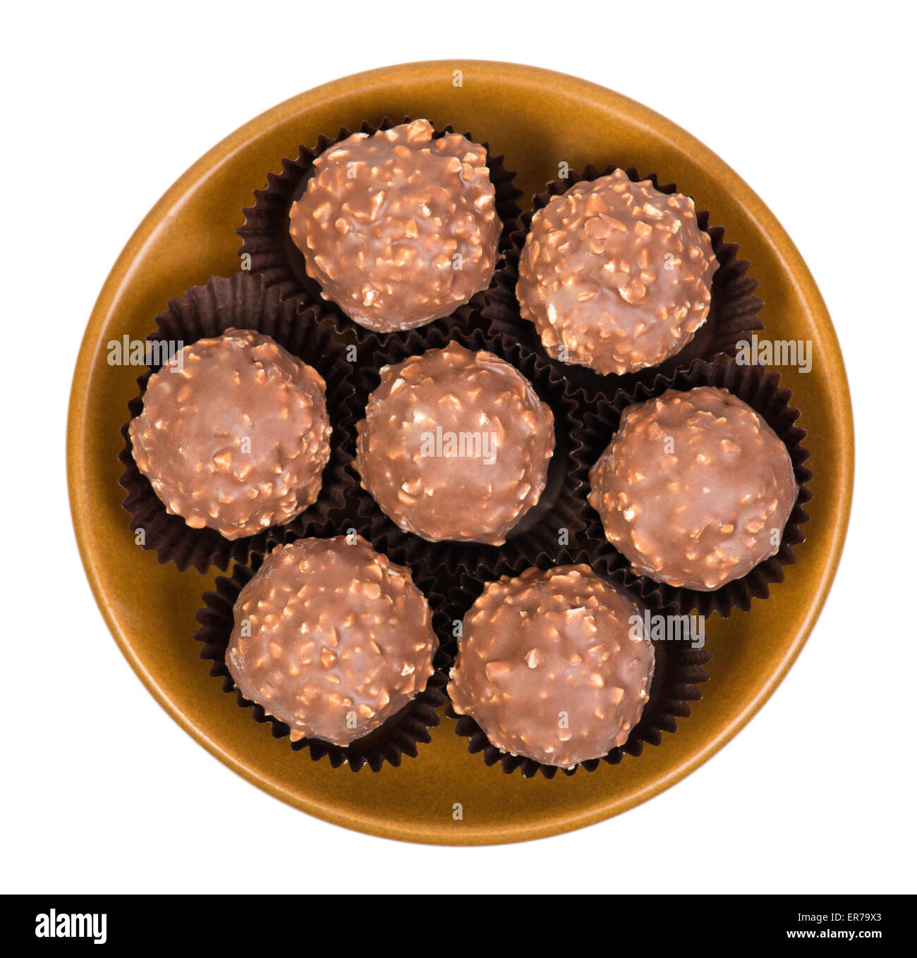chocolate candy in tartlet form on white Stock Photo - Alamy