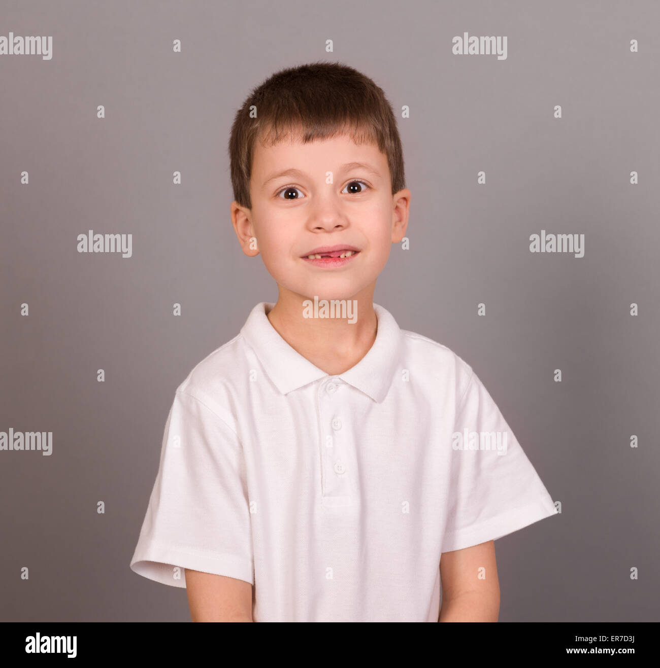 sad boy on grey Stock Photo - Alamy