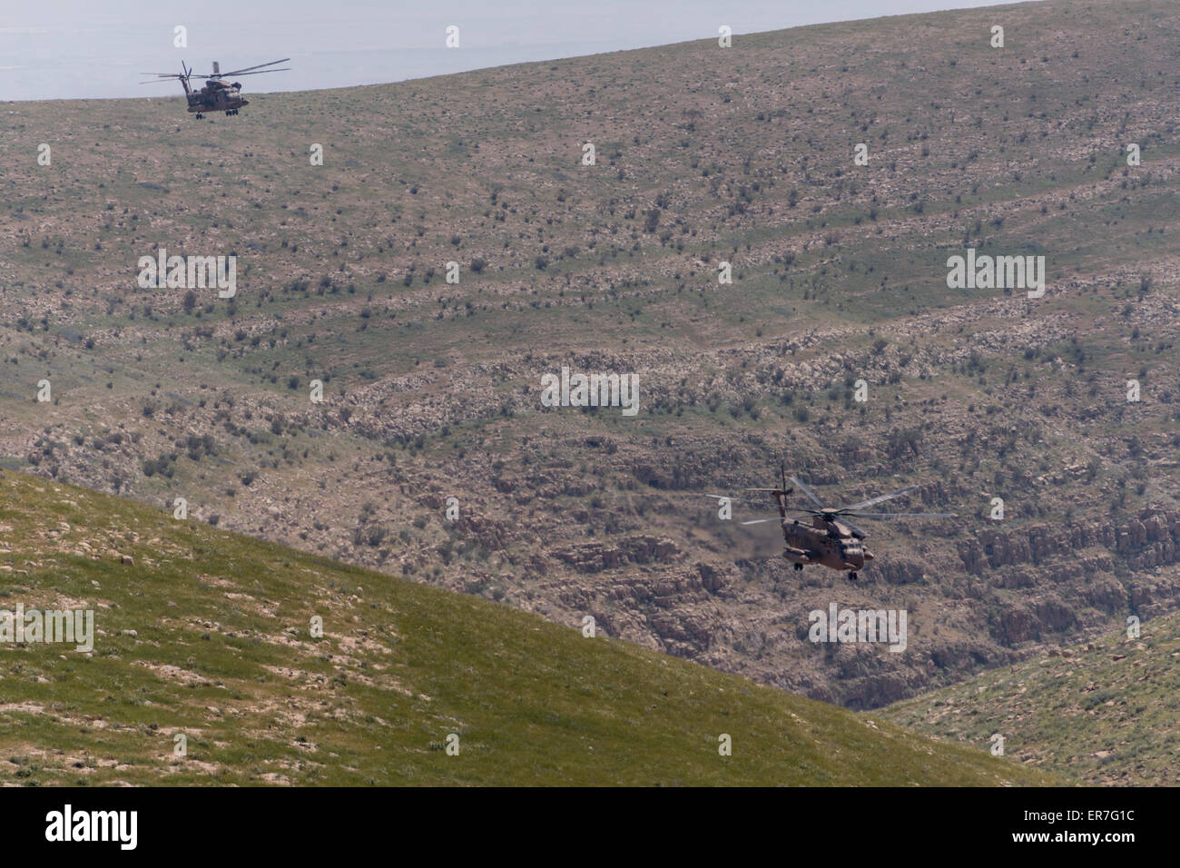 Israel. Two air force Ch-53 military transport helicopters flying low ...