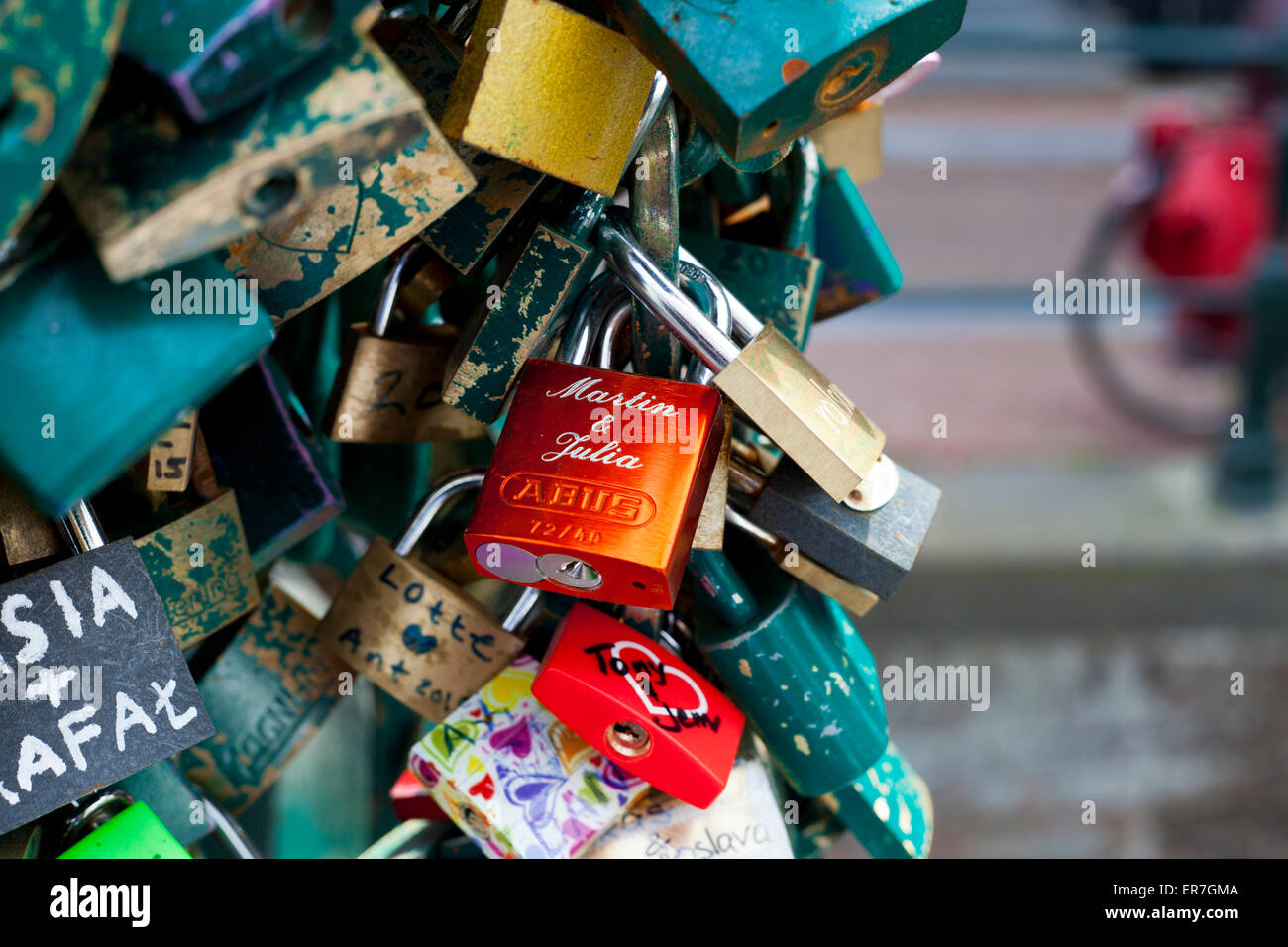 Love padlocks on the bridge over canal Kloveniersburgwal Amsterdam ...