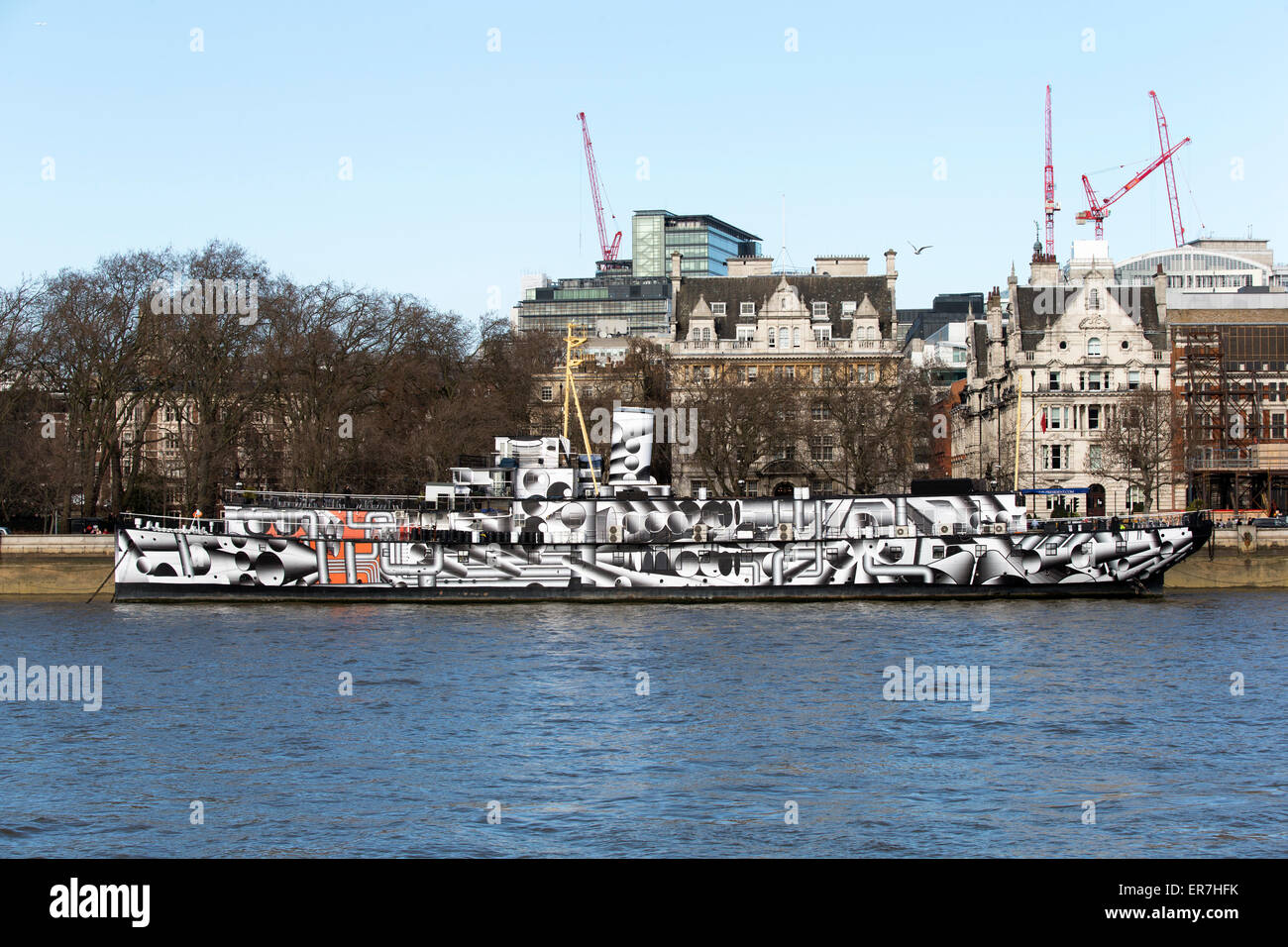 HMS President covered in WWI dazzle camouflage on the River Thames ...