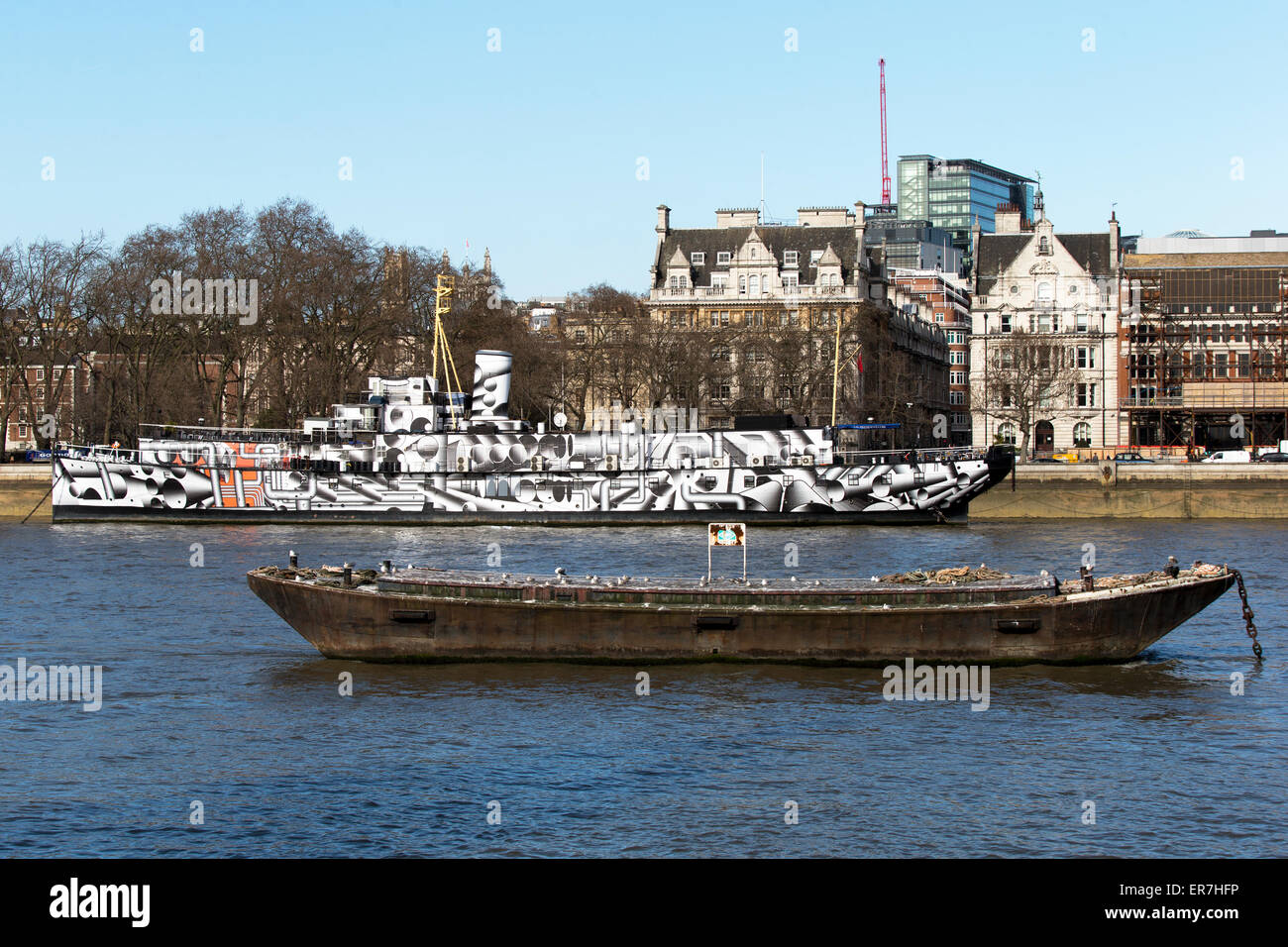 HMS President covered in WWI dazzle camouflage on the River Thames ...